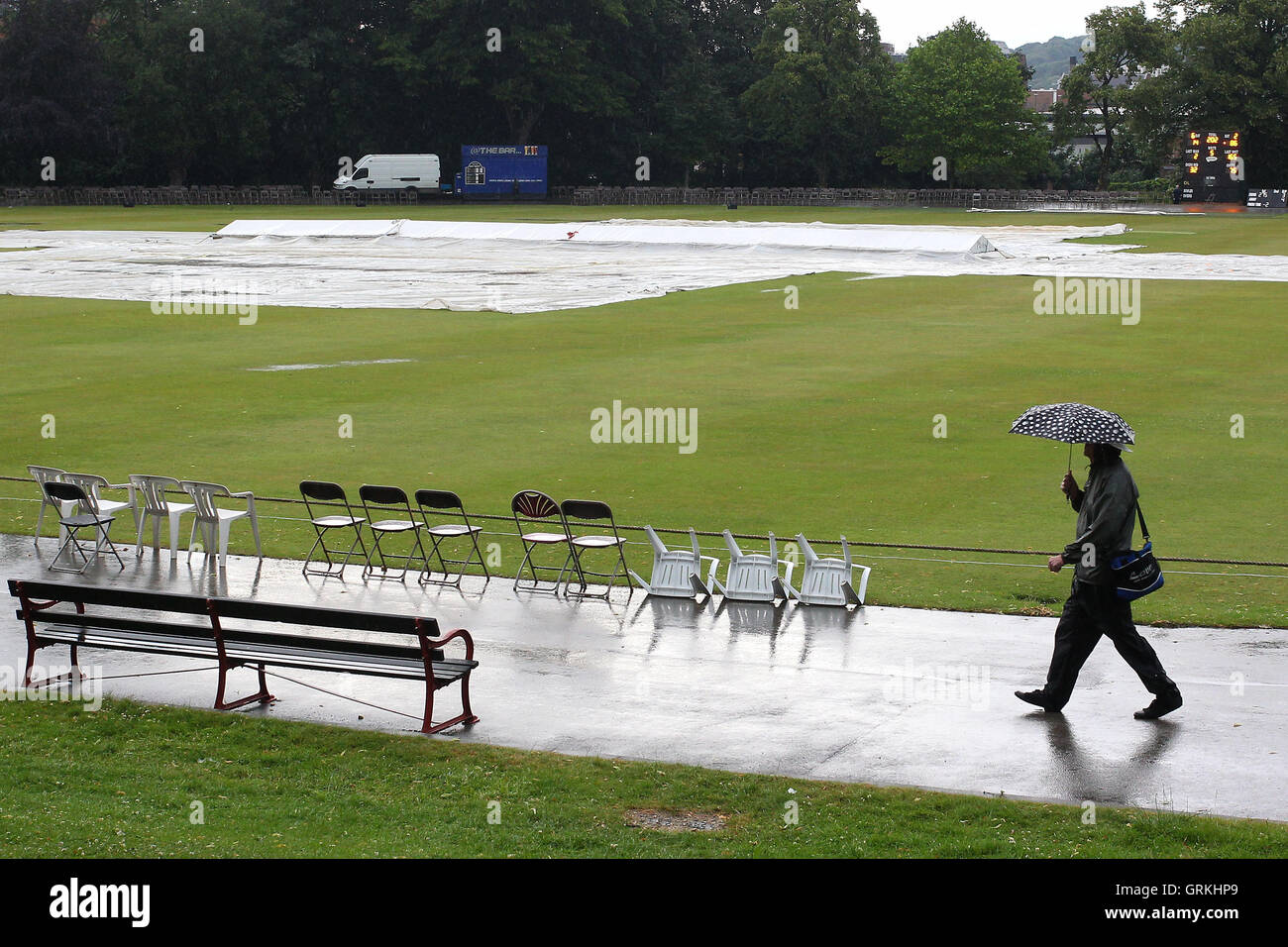 A bleak scene as heavy rain causes play to be abandoned on Day Two ...