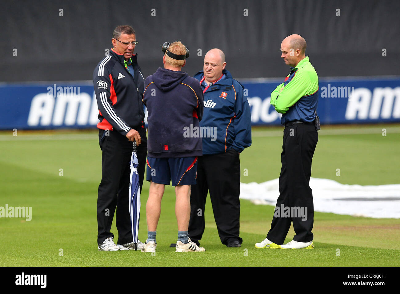 Umpires David Millns (L) and Mike Burns (R) in conversation with ground ...