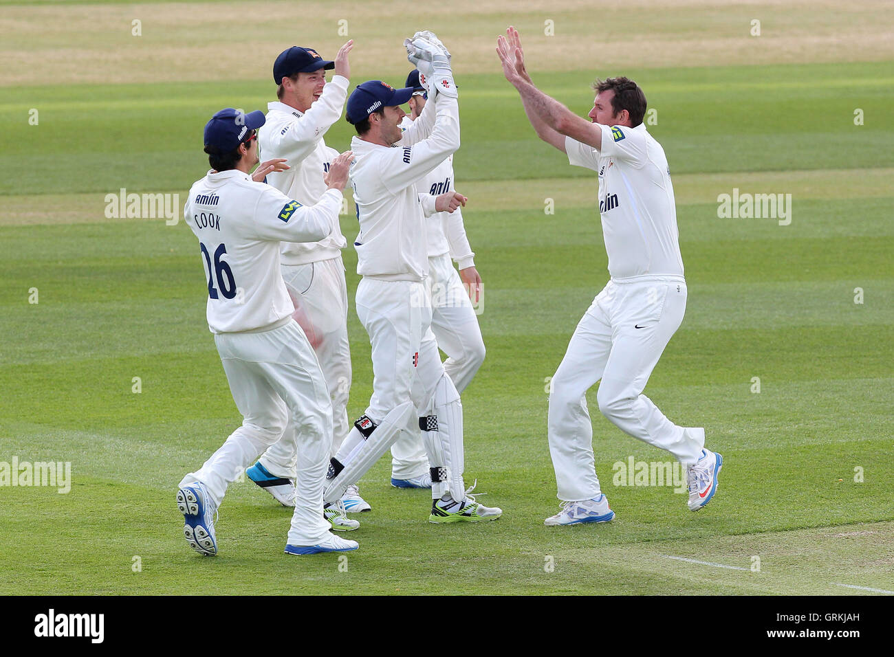 David Masters of Essex (R) celebrates the wicket of David Wainwright of ...