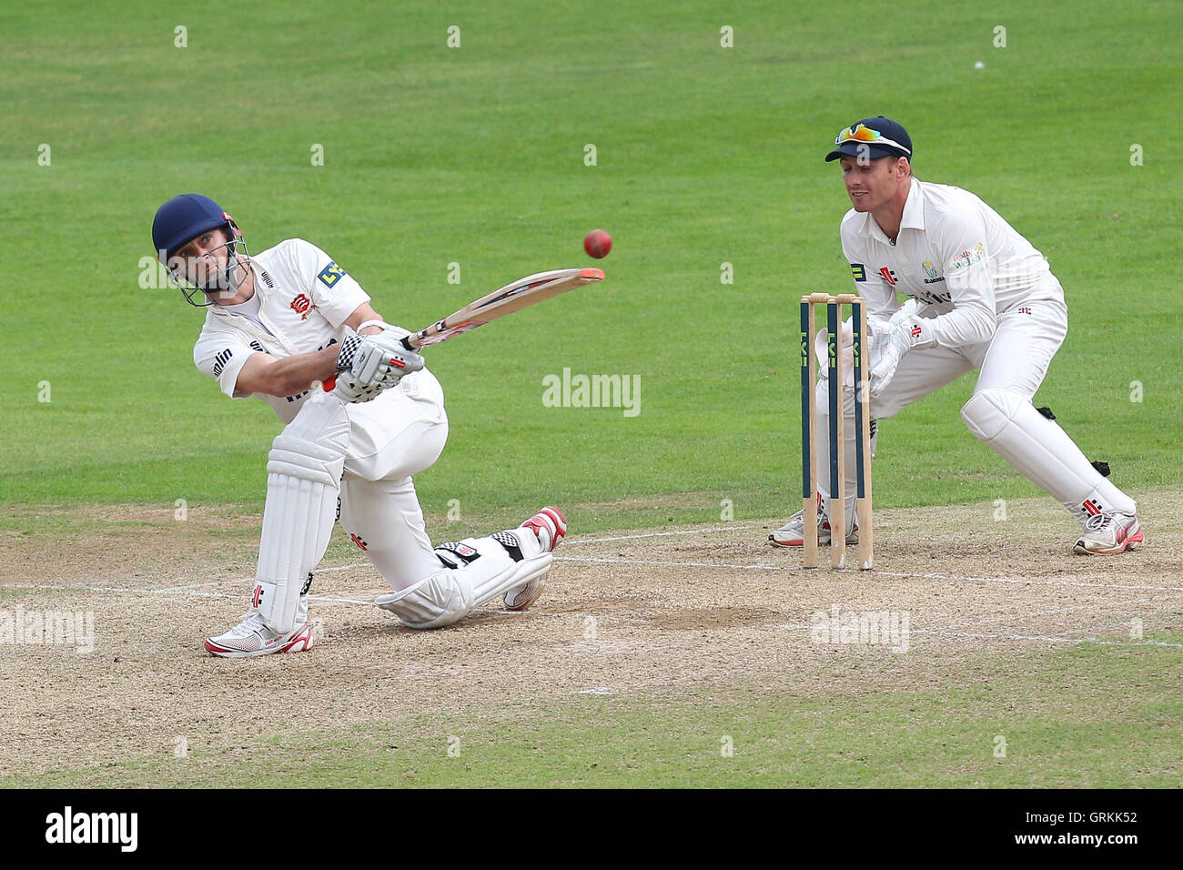 Four runs for James Foster of Essex as Mark Wallace looks on - Essex ...