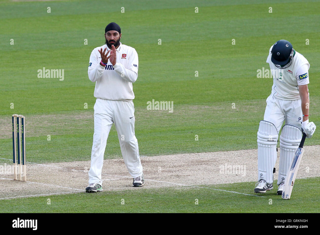 Monty Panesar of Essex celebrates the wicket of Anthony Ireland( R ...