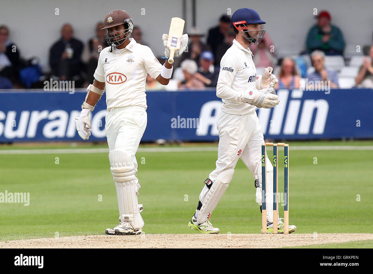 Arun Harinath (L) of Surrey acknowledges his half-century - Essex CCC ...