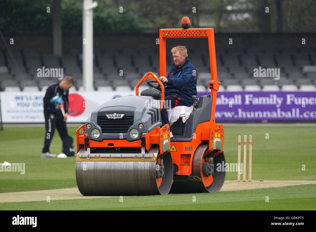 Essex head groundsman Stuart Kerrison rolls the pitch ahead of the ...