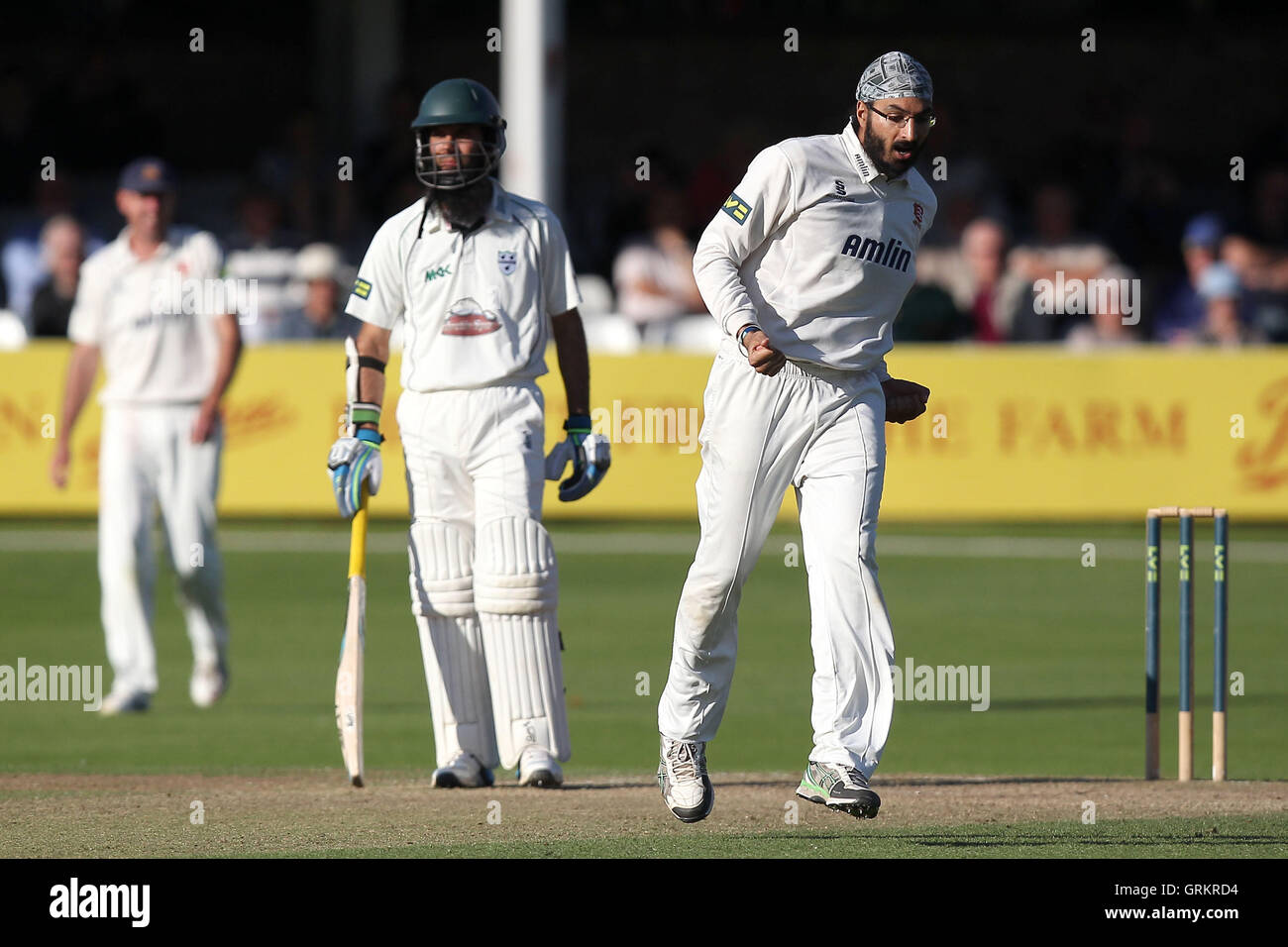 Monty Panesar of Essex celebrates taking the wicket of Daryl Mitchell ...