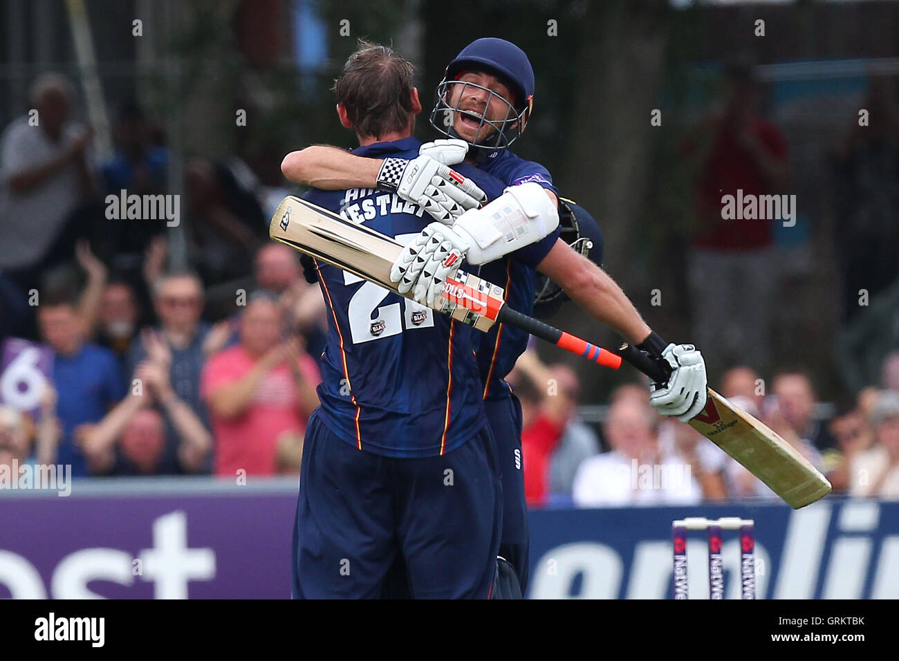 Tom Westley of Essex celebrates his century from 55 balls with James ...