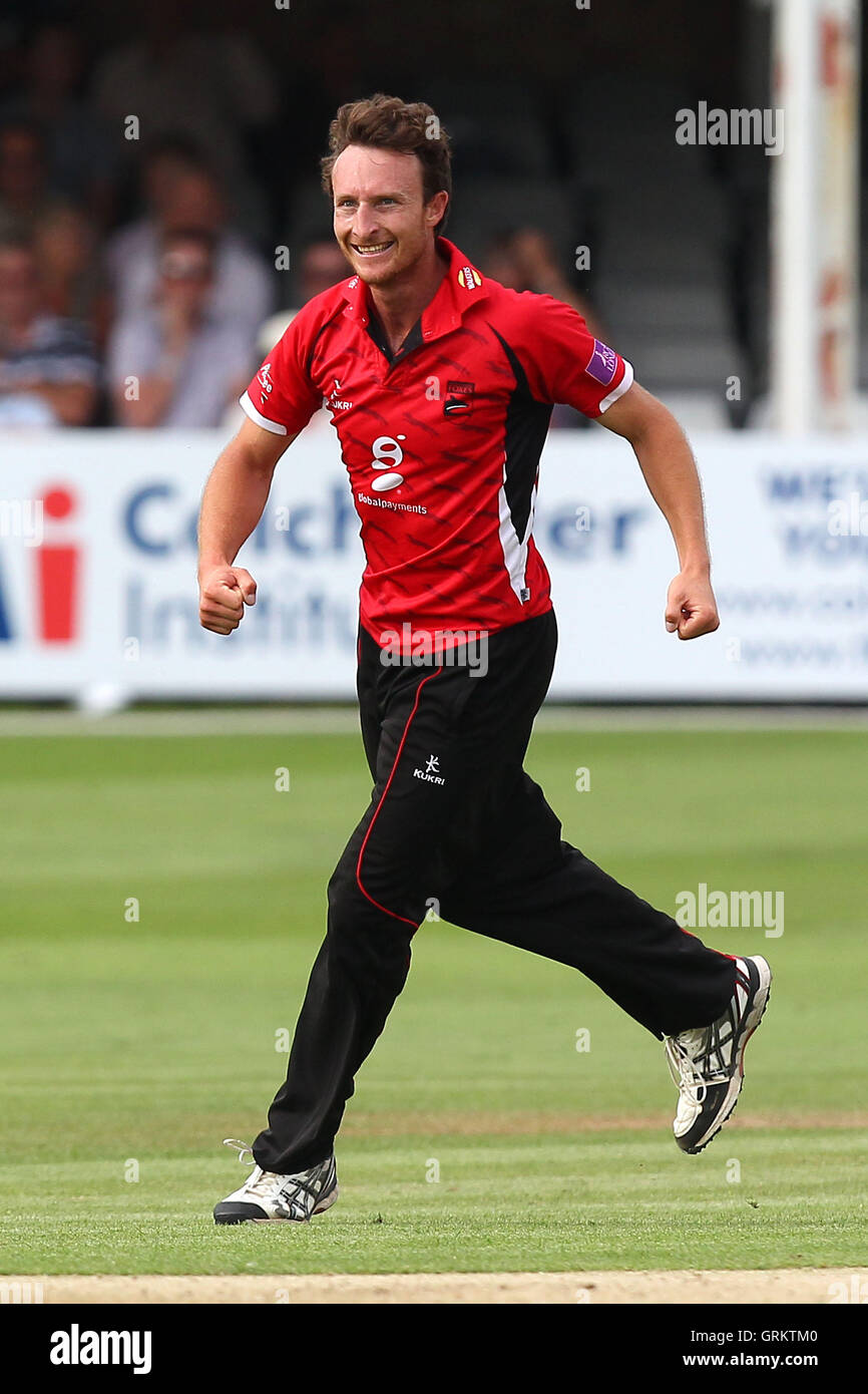 Anthony Ireland (L) of Leicestershire celebrates the wicket of Jesse ...