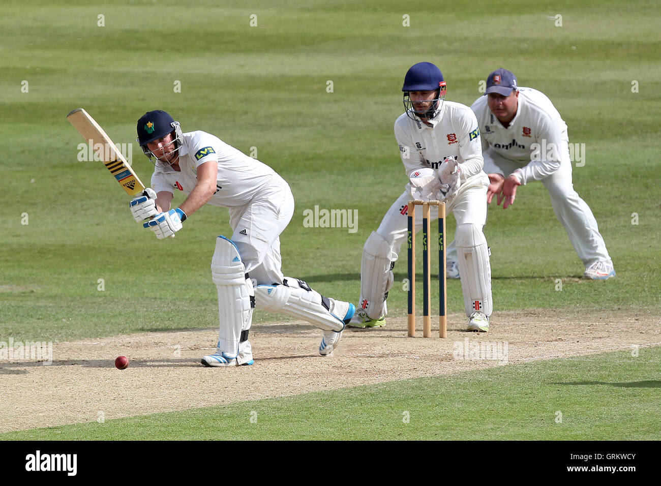 Chris Cooke in batting action for Glamorgan as James Foster looks on ...
