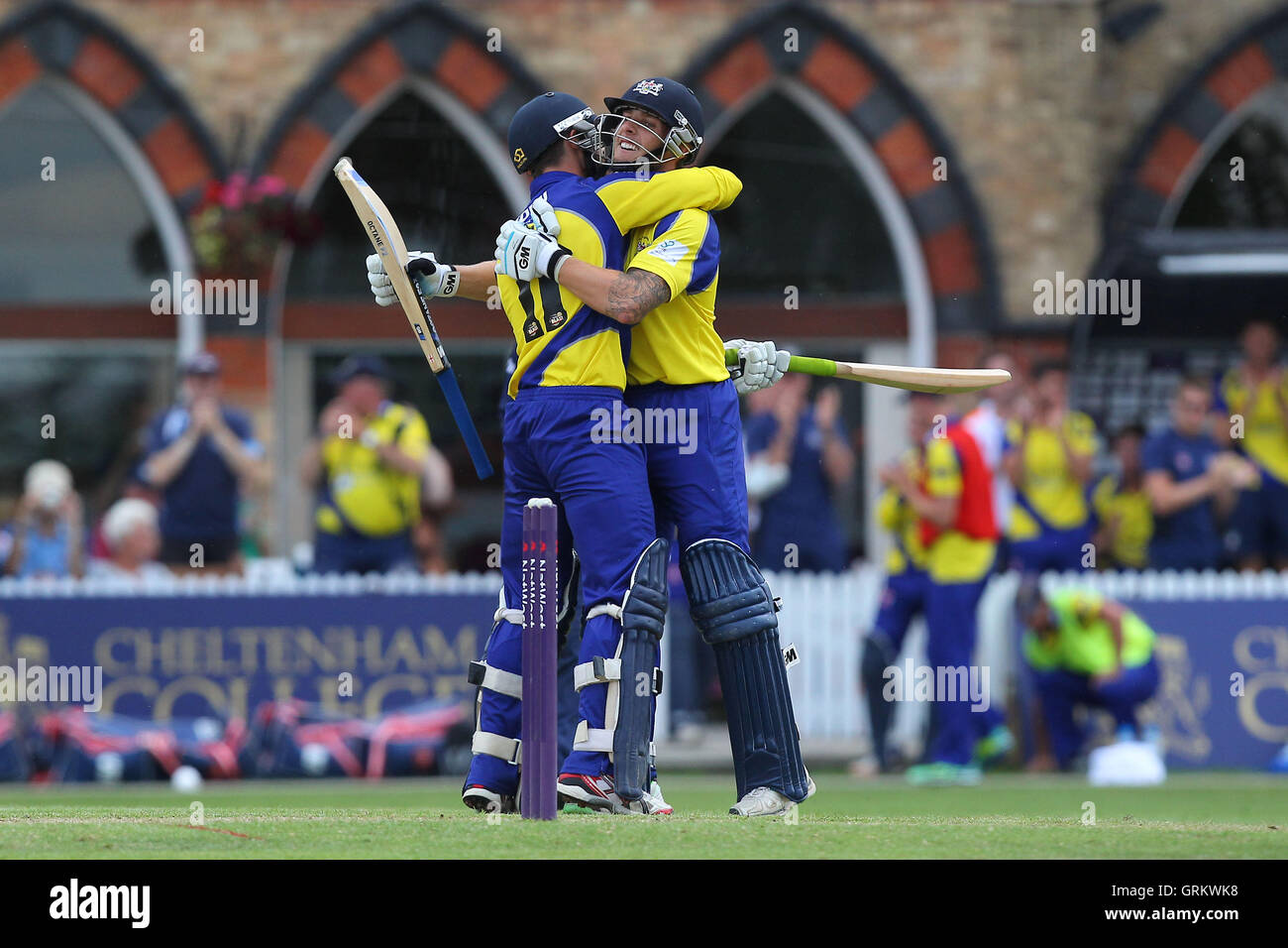 Chris Dent (R) hits the winning runs for Gloucestershire and celebrates ...
