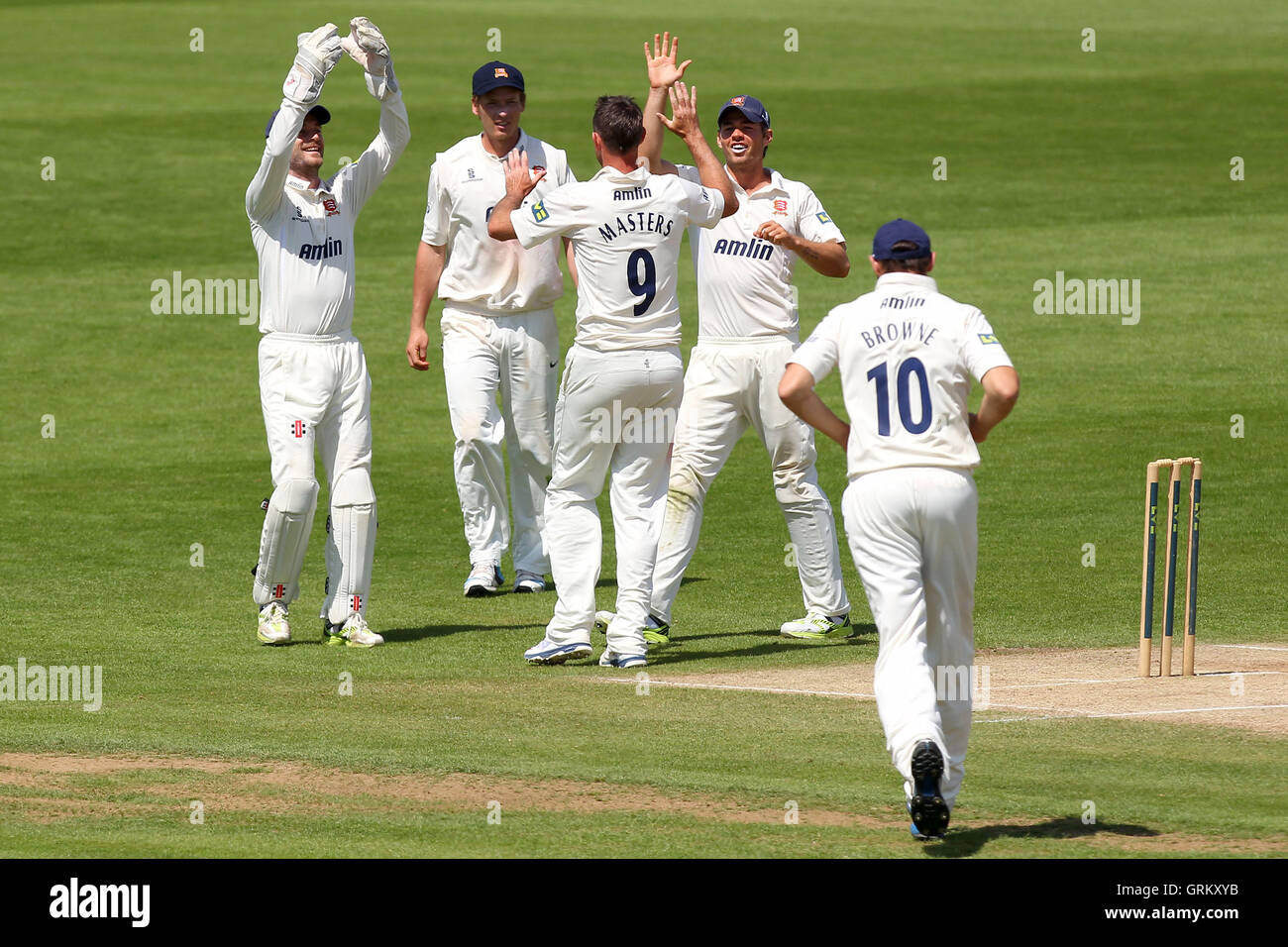 David Masters of Essex is congratulated on the wicket of Ben Harmison ...