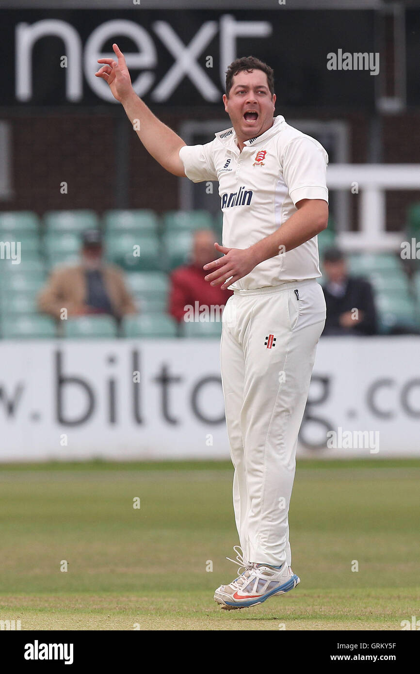 Jesse Ryder of Essex celebrates taking the wicket of Angus Robson ...