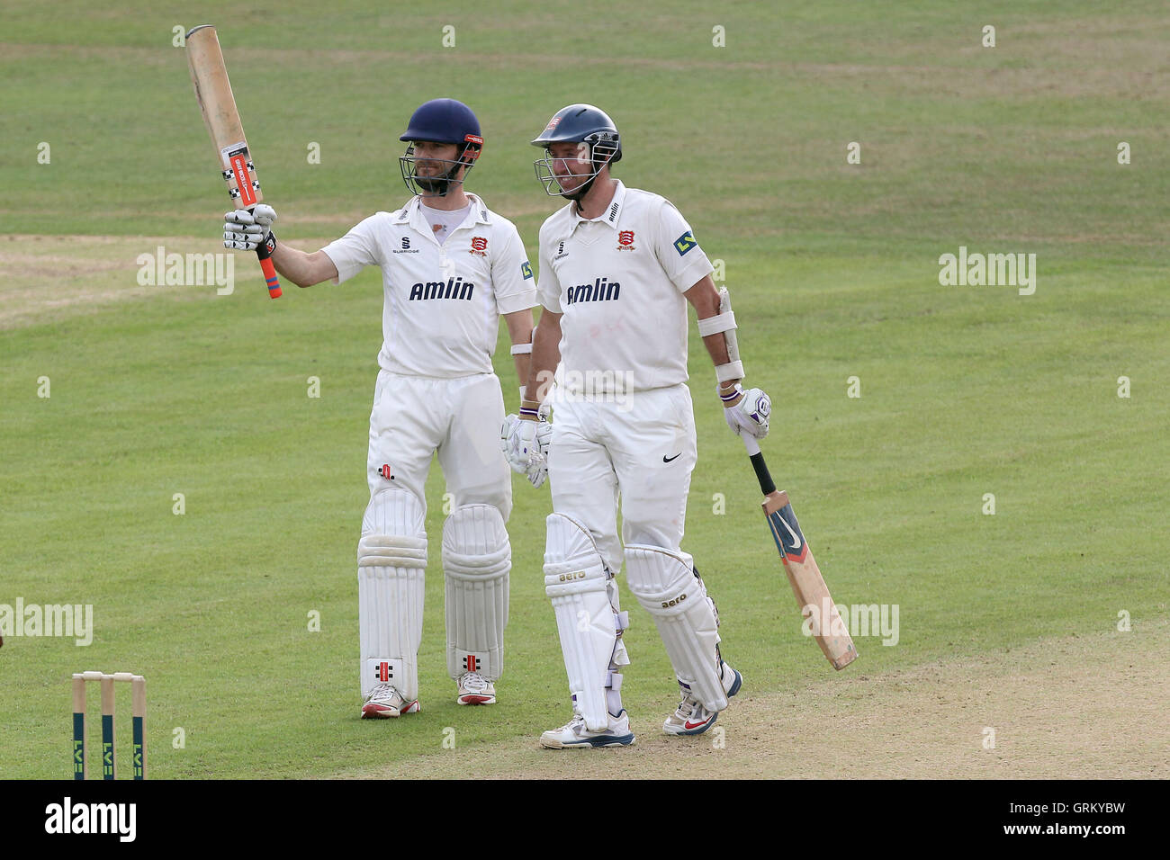 James Foster (L) of Essex celebrates his century alongside batting ...