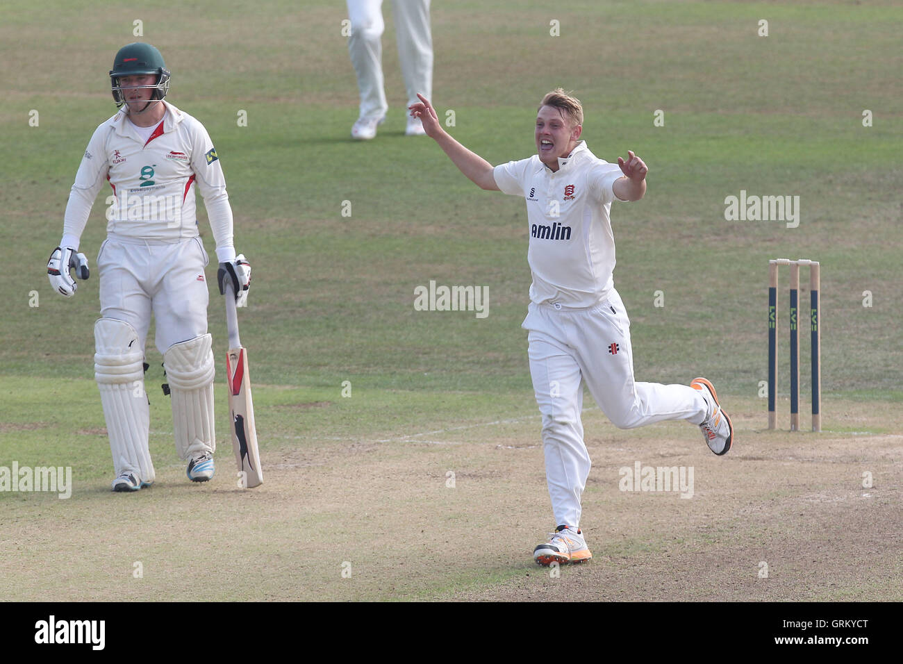 Jamie Porter of Essex celebrates taking the wicket of Ned Eckersley ...