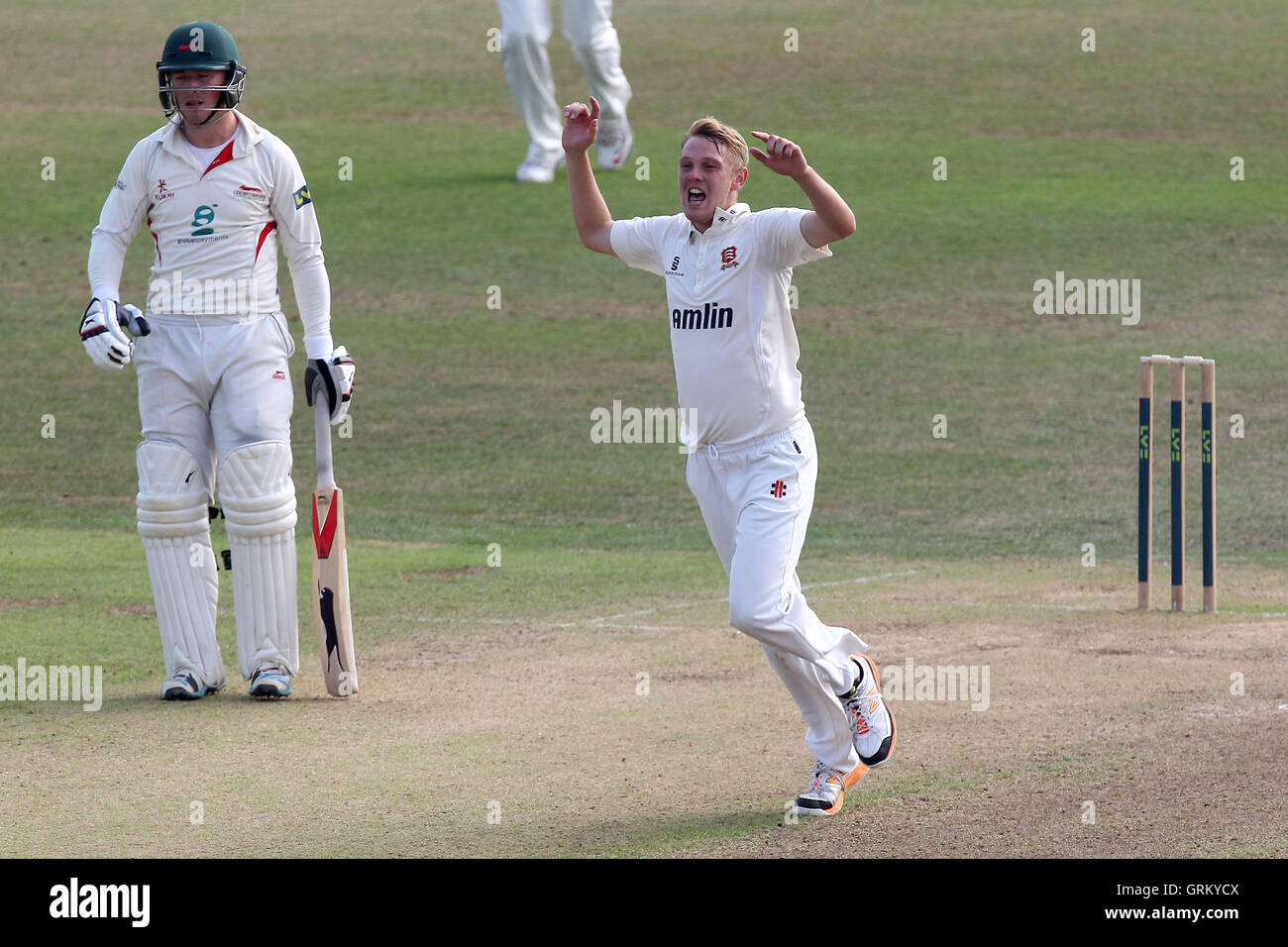Jamie Porter of Essex celebrates taking the wicket of Ned Eckersley ...
