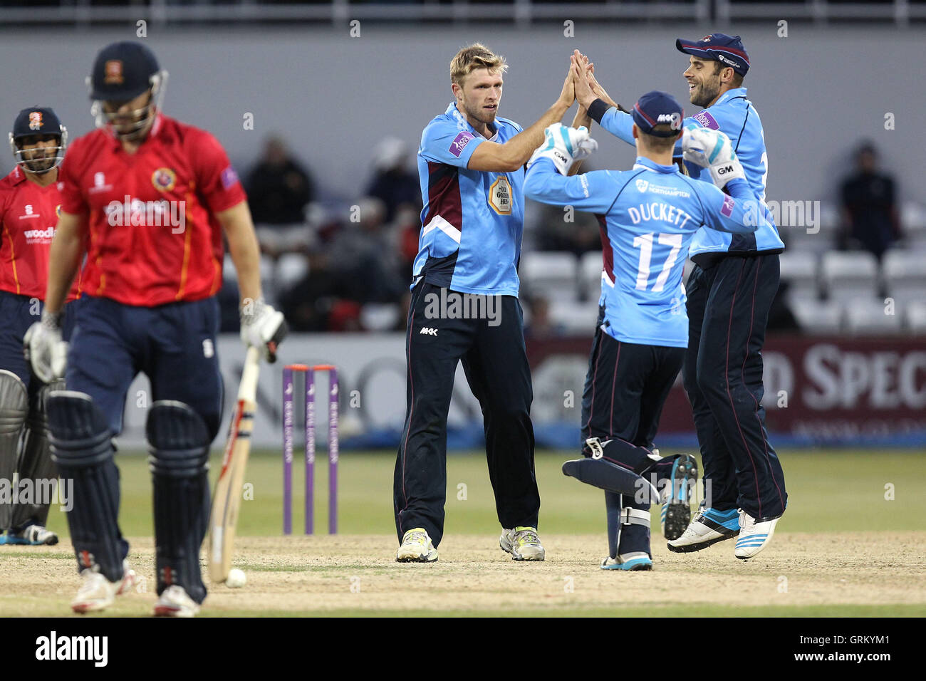 David Willey of Northants (C) celebrates the wicket of Jaik Mickleburgh ...