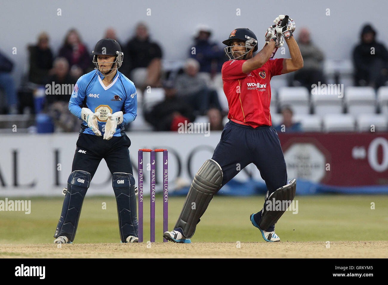 Ravi Bopara hits out for Essex as Ben Duckett looks on ...