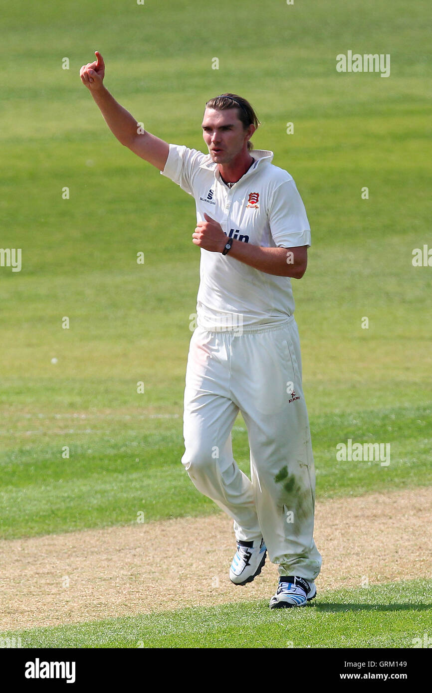 Oliver Newby of Essex claims the wicket of Alex Kervezee ...