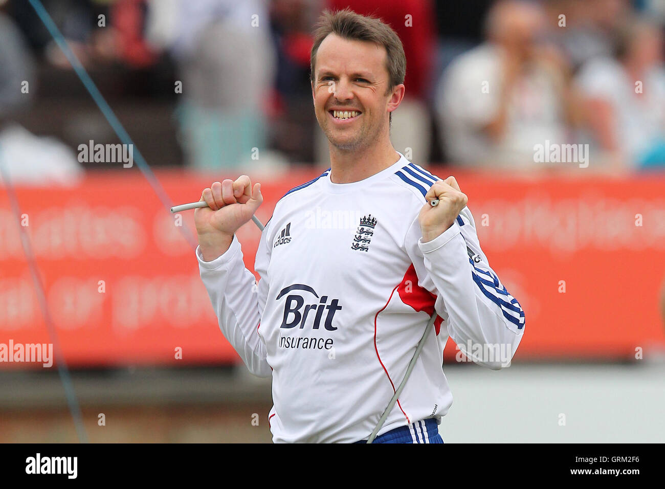 Graeme Swann of England smiles during the warm-up stretches - Essex CCC ...