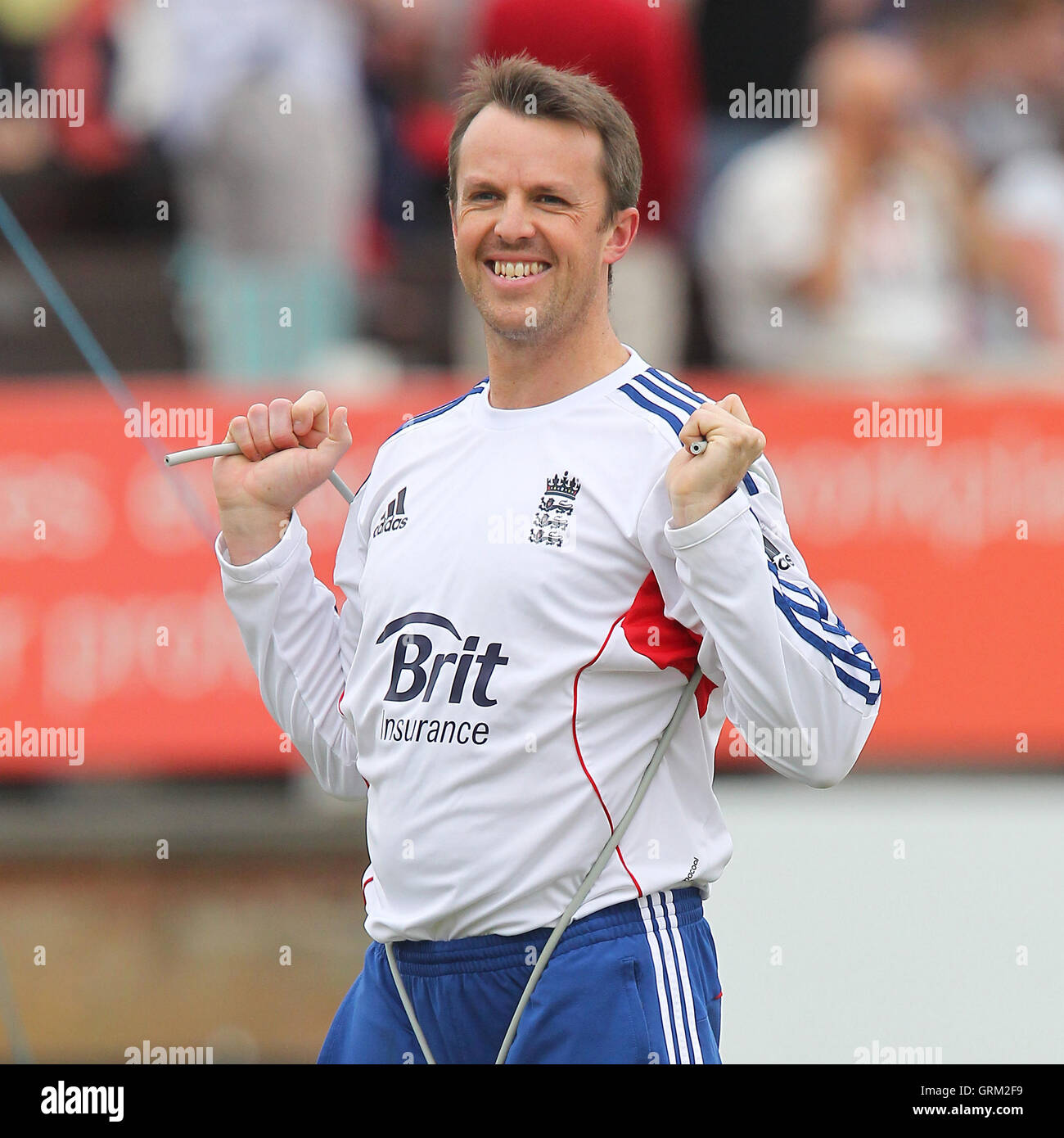 Graeme Swann of England smiles during the warm-up stretches - Essex CCC ...