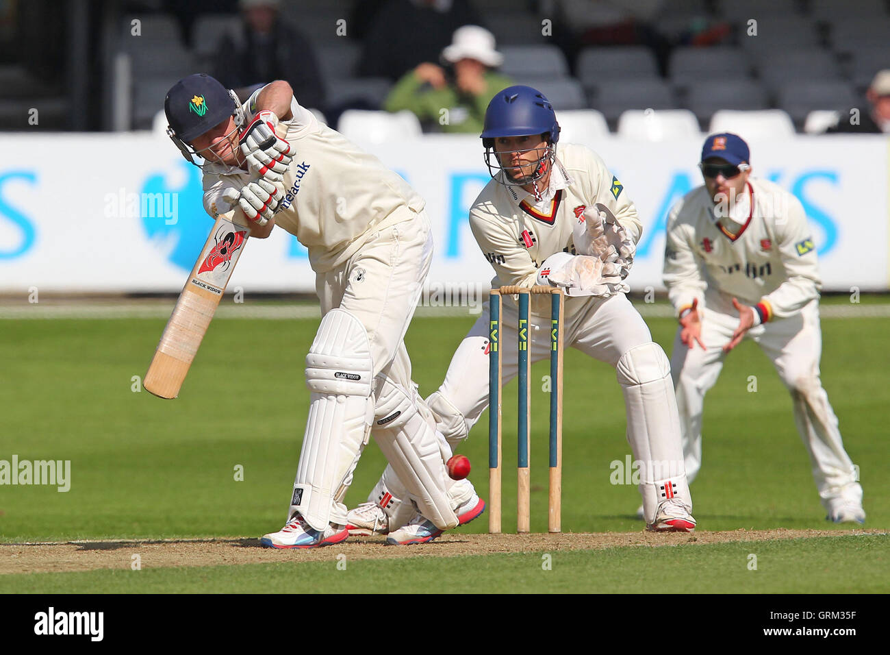 Chris Cooke in batting action for Glamorgan as James Foster looks on ...