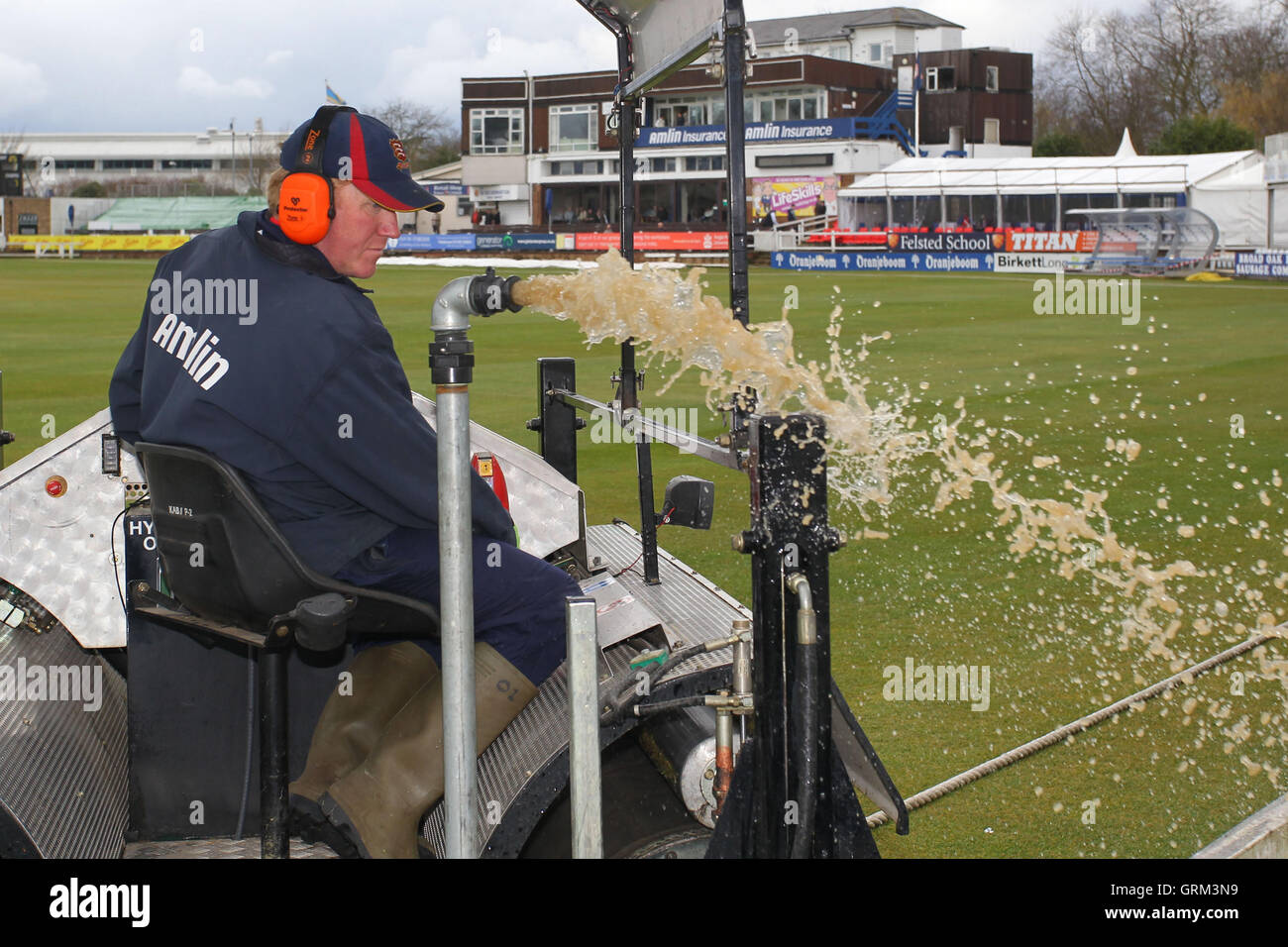 Umpires Martin Saggers (L) and Richard Illingworth speak to Essex head ...