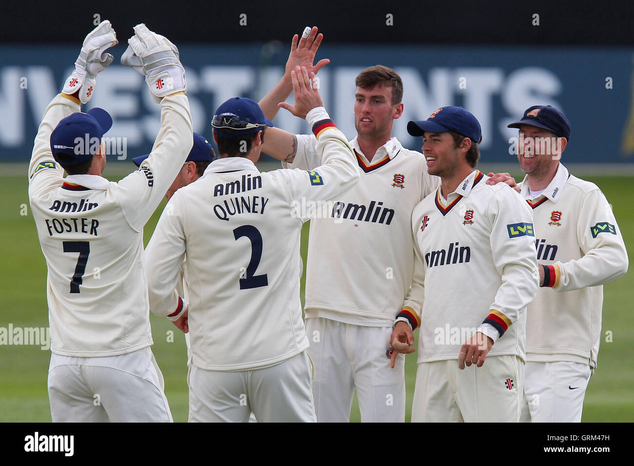 Reece Topley of Esse (3rd R) celebrates the wicket of Adam Wheater ...