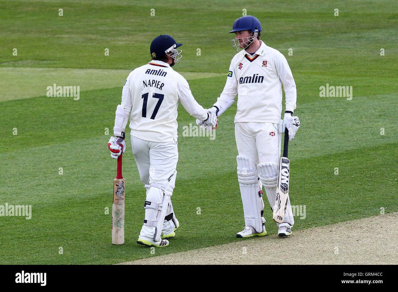 Tim Phillips (R) of Essex congratulates Graham Napier on his half ...