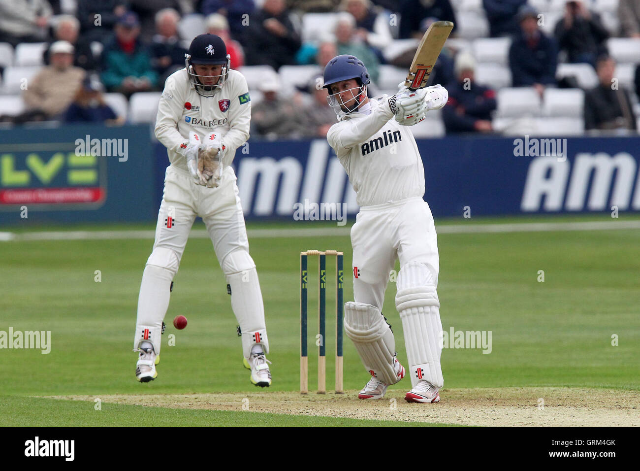 James Foster in batting action for Essex as Geraint Jones looks on ...