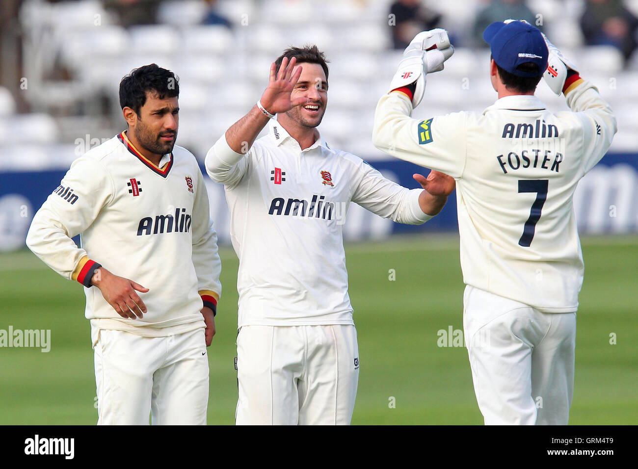 Ryan ten Doeschate of Essex (C) celebrates the wicket of Ben Harmison ...