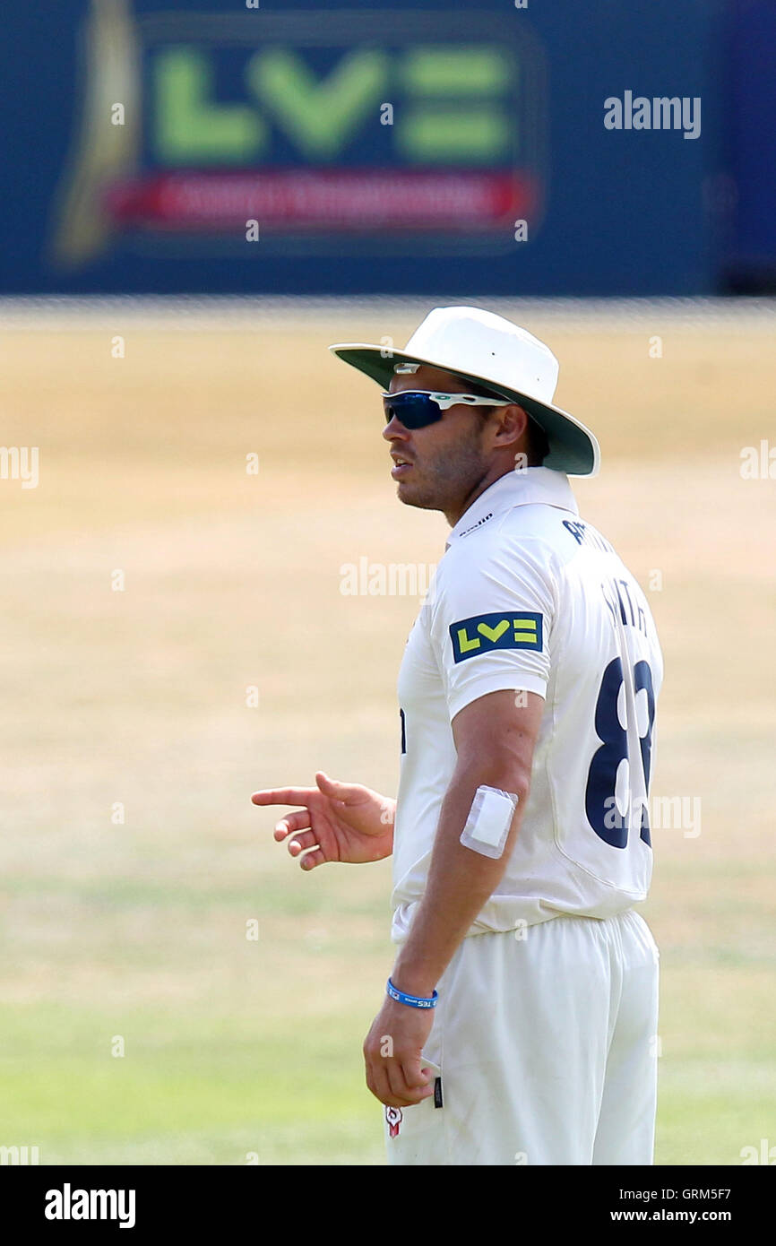 Greg Smith of Essex with an injury to his arm after falling whilst ...