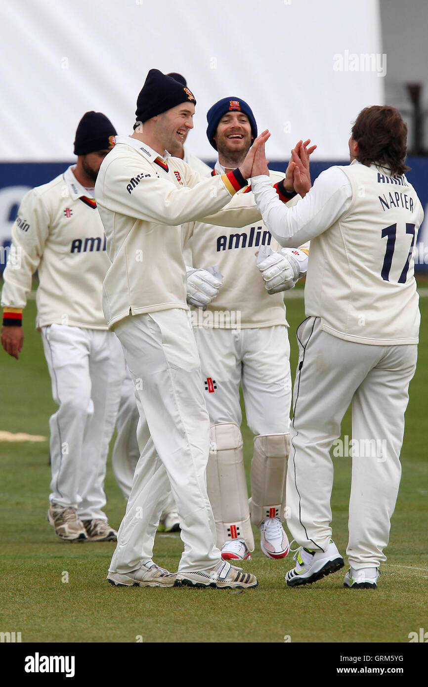Graham Napier of Essex celebrates the wicket of Adam Rossington with ...