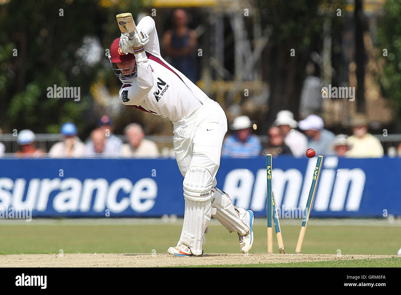 Rob Keogh of Northants is bowled out by Graham Napier - Essex CCC vs ...