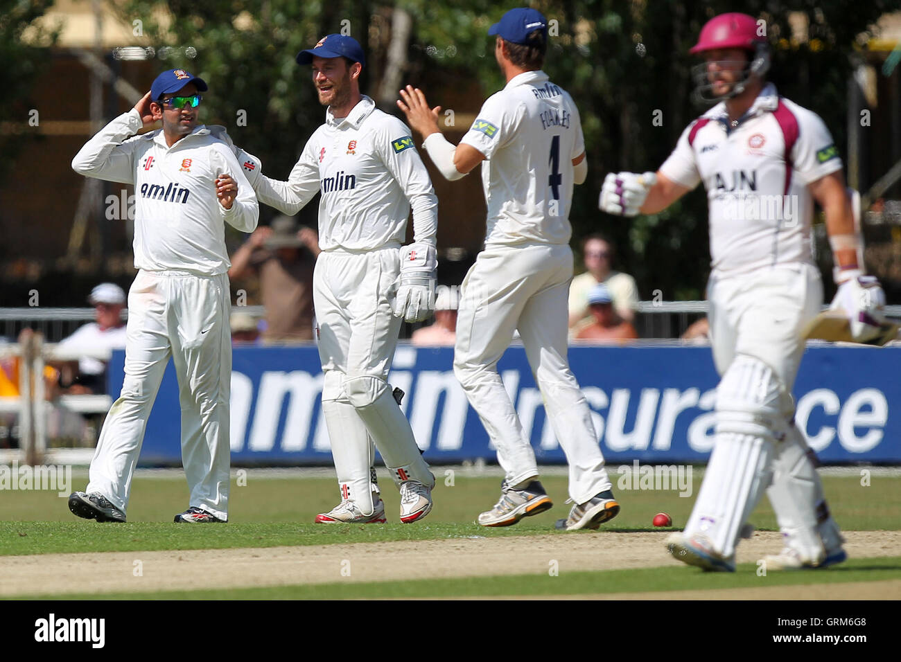 Gautam Gambhir of Essex (L) takes a fine catch to dismiss Steven Crook ...