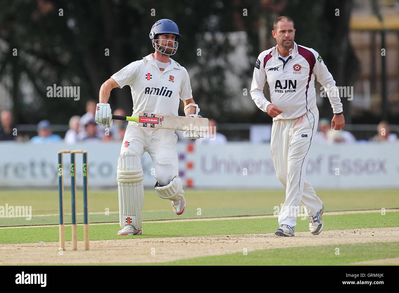 James Foster of Essex completes a run as Andrew Hall looks on - Essex ...