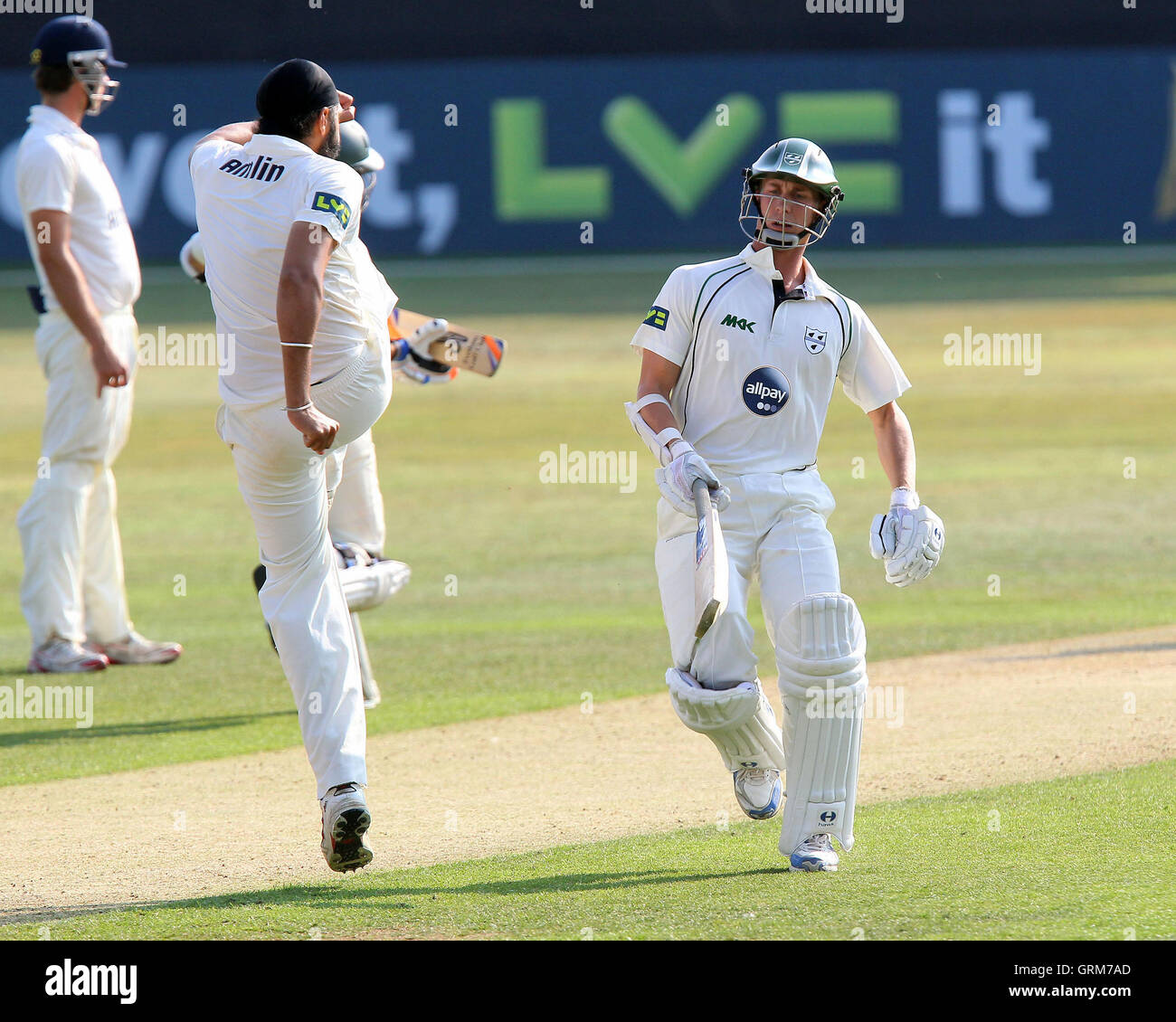 Monty Panesar of Essex kicks out as Worcestershire batsman Matthew ...
