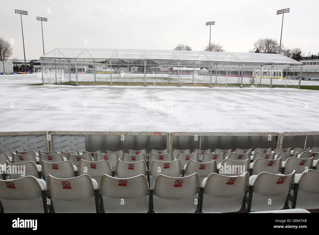 Snow covers the outfield at the Essex County Ground in Chelmsford ...