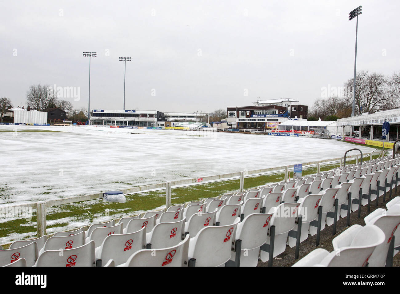 Snow covers the outfield at the Essex County Ground in Chelmsford ...