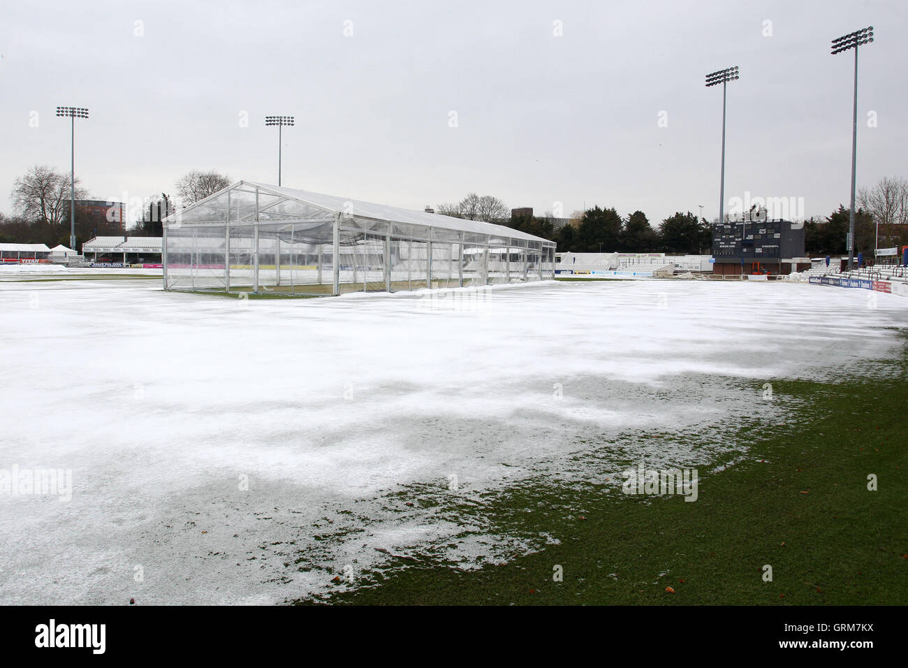 Snow covers the outfield at the Essex County Ground in Chelmsford ...