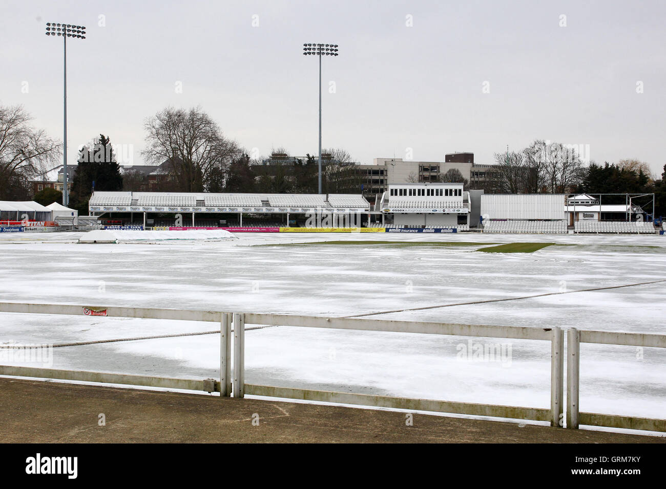 Snow covers the outfield at the Essex County Ground in Chelmsford ...