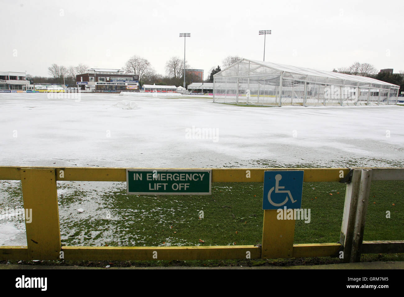 Snow covers the outfield at the Essex County Ground in Chelmsford ...