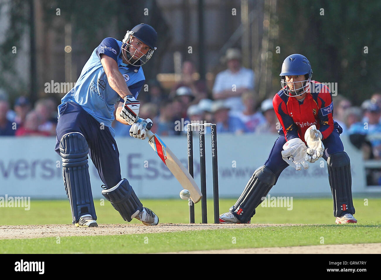 David Wainwright of Derbyshire hits out as James Foster looks on ...
