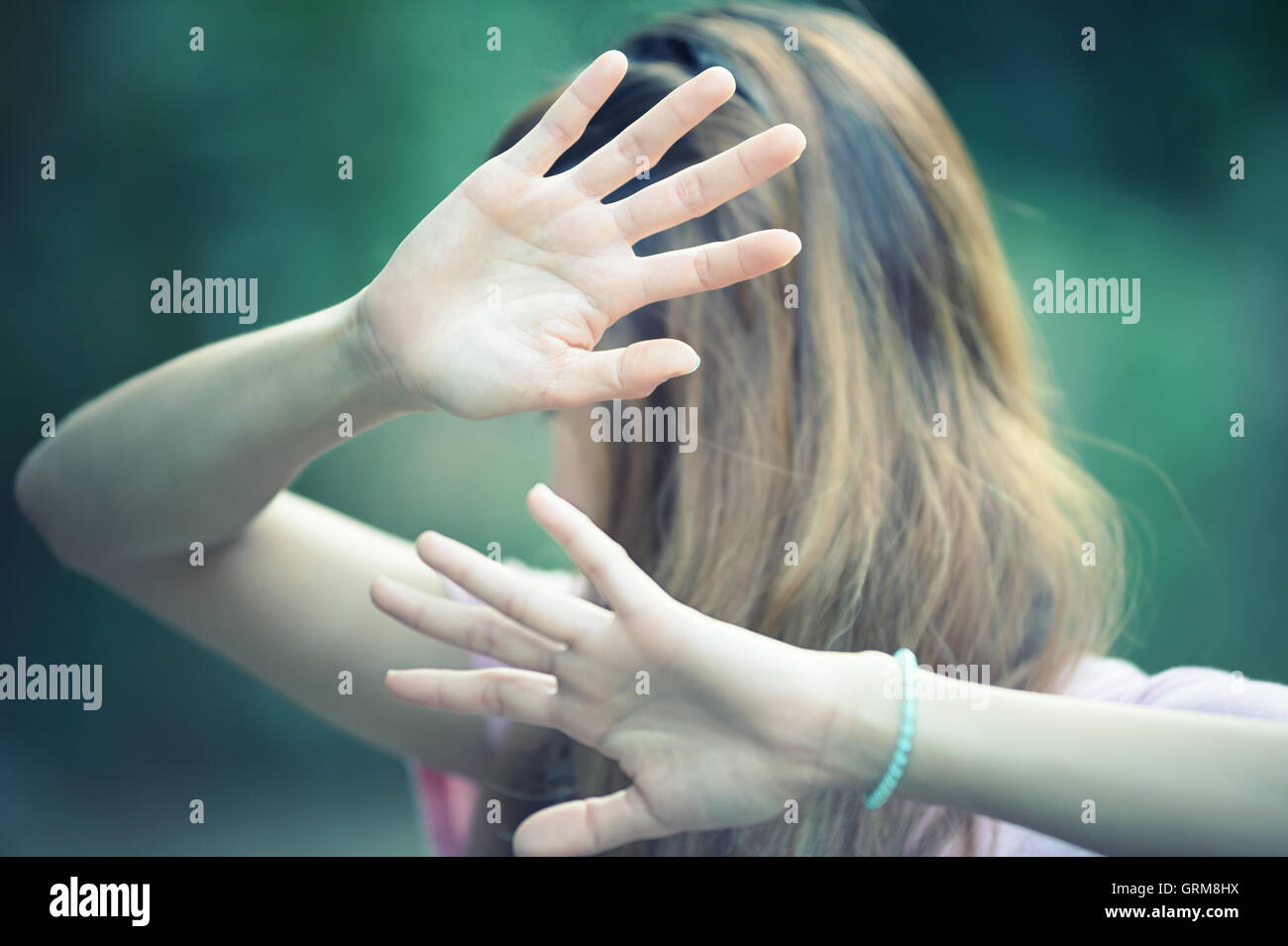 Asian women showing stop hand gesture, focus hand Stock Photo - Alamy