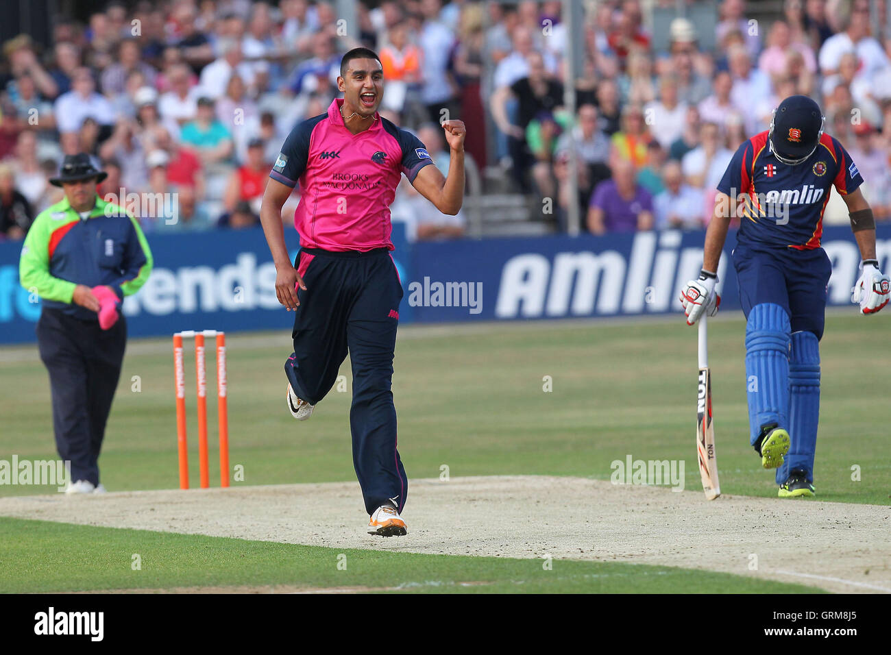 Gurjit Sandhu of Middlesex celebrates the wicket of Ryan ten Doeschate ...