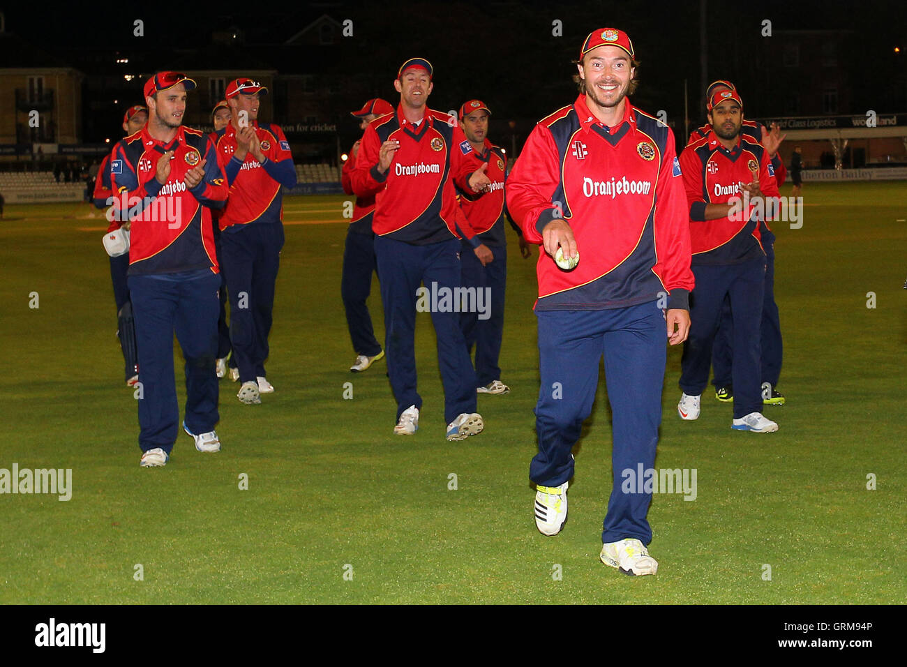 Graham Napier of Essex leaves the field ahead of his team mates having ...