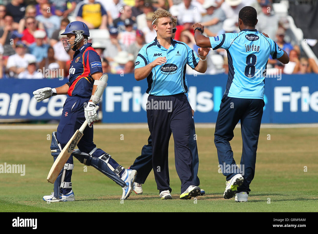 Rory Hamilton-Brown of Sussex (C) is the first to congratulate Chris ...