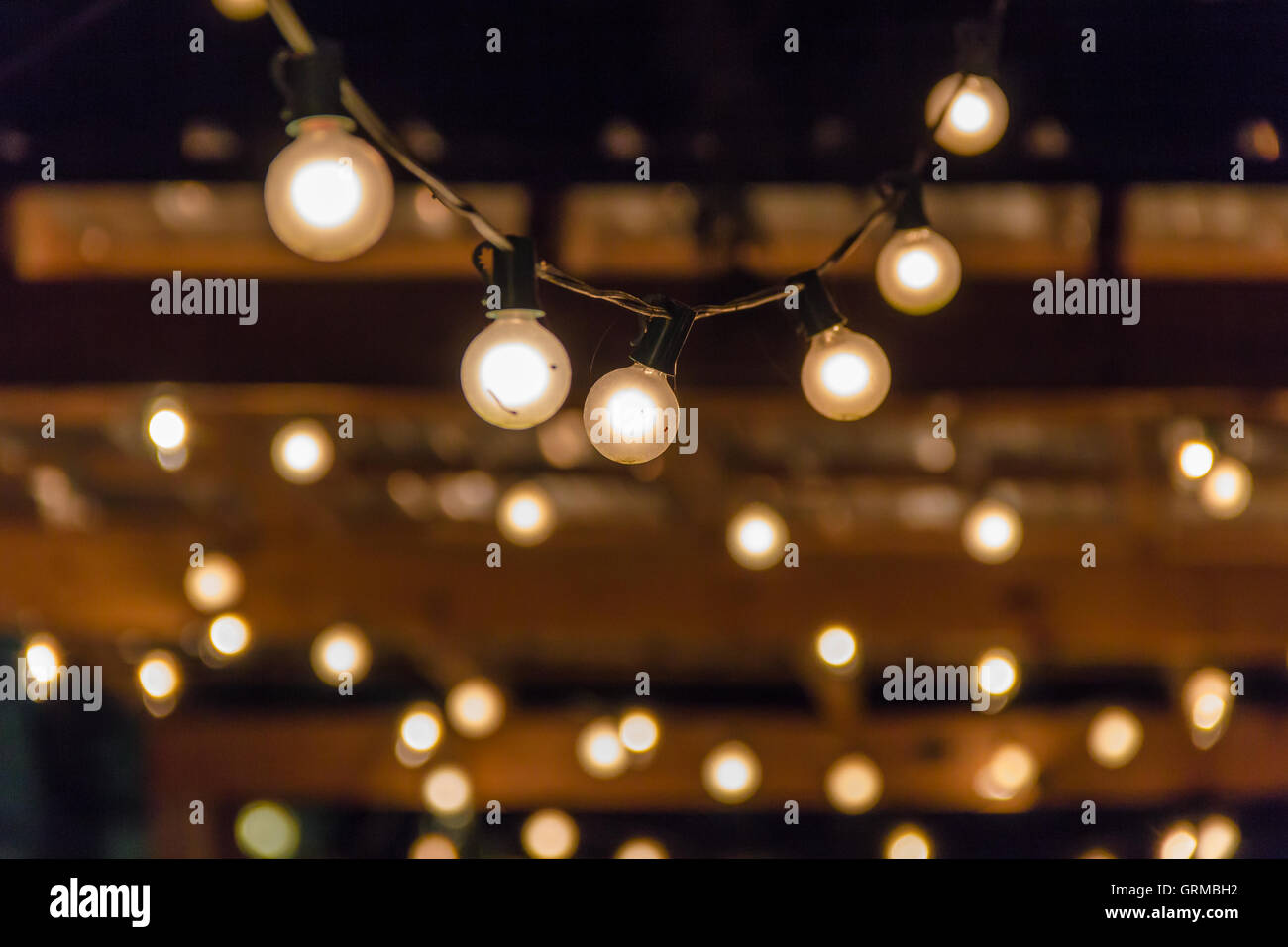 String lights at a party Stock Photo - Alamy