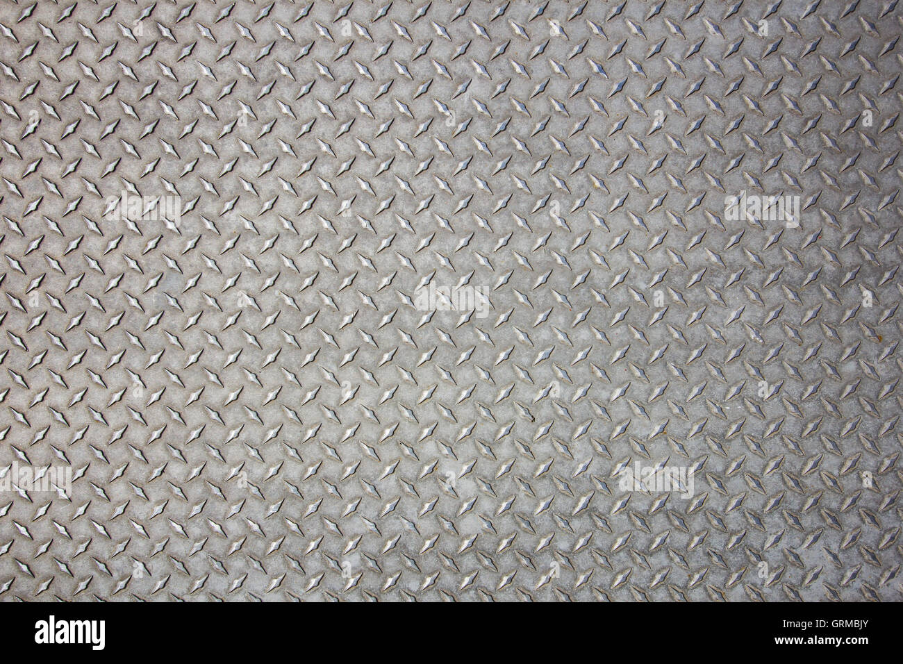 Gray textured metal grate for background Stock Photo - Alamy