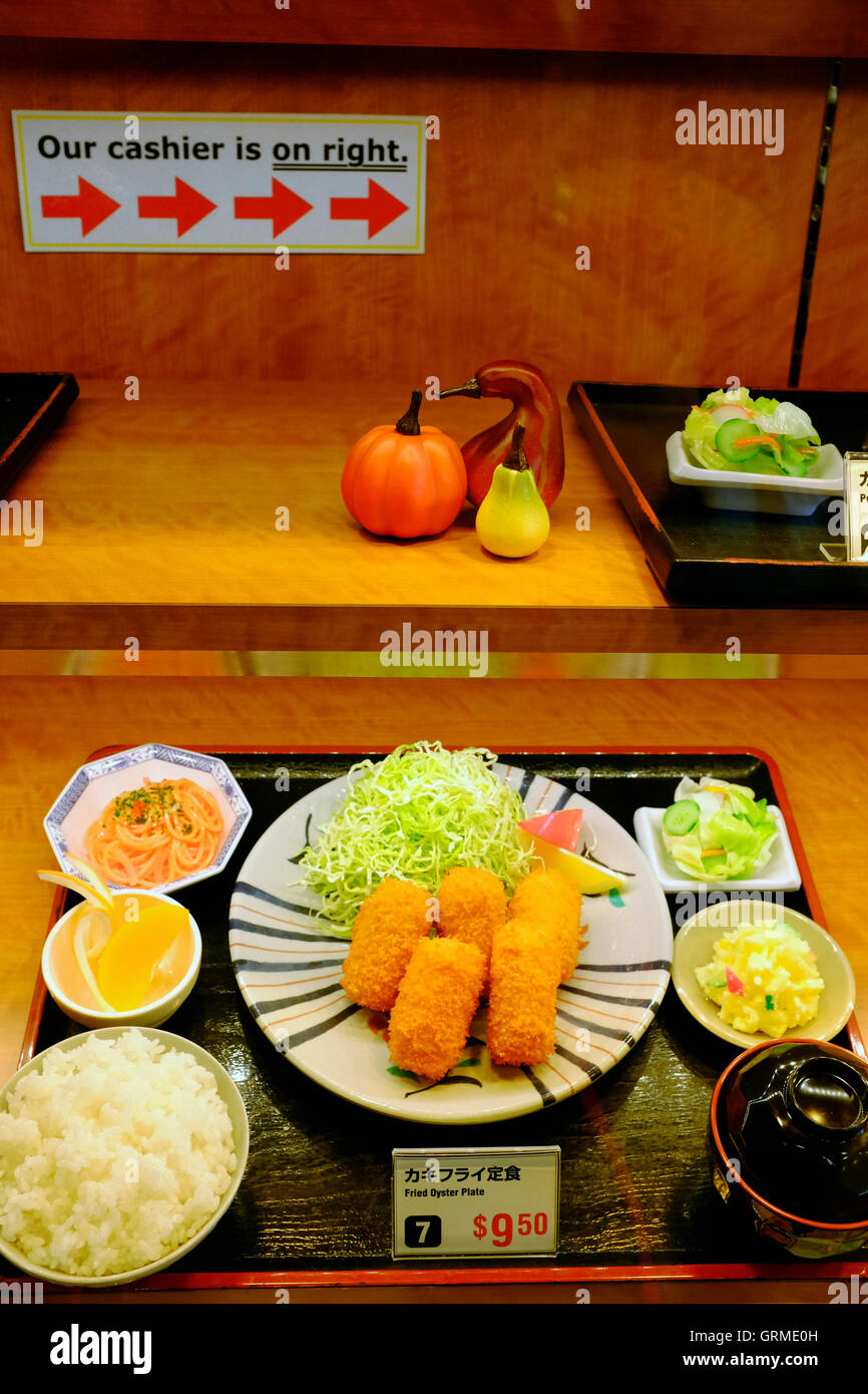 Plastic food samples display in the window of a Japanese restaurant ...