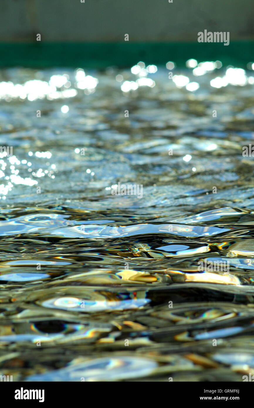 Surface of water bassin Stock Photo - Alamy