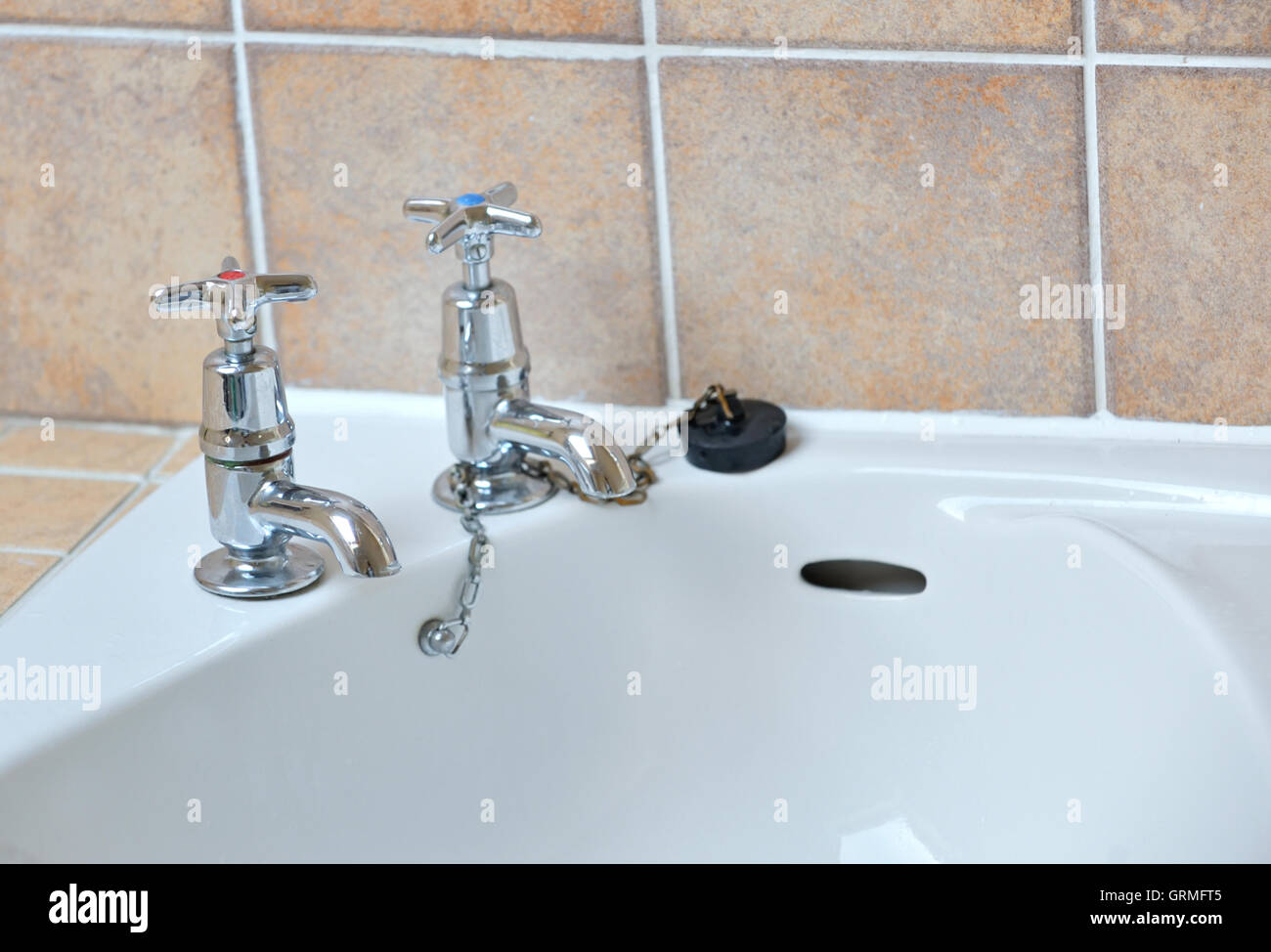 old irish mixer taps Stock Photo - Alamy