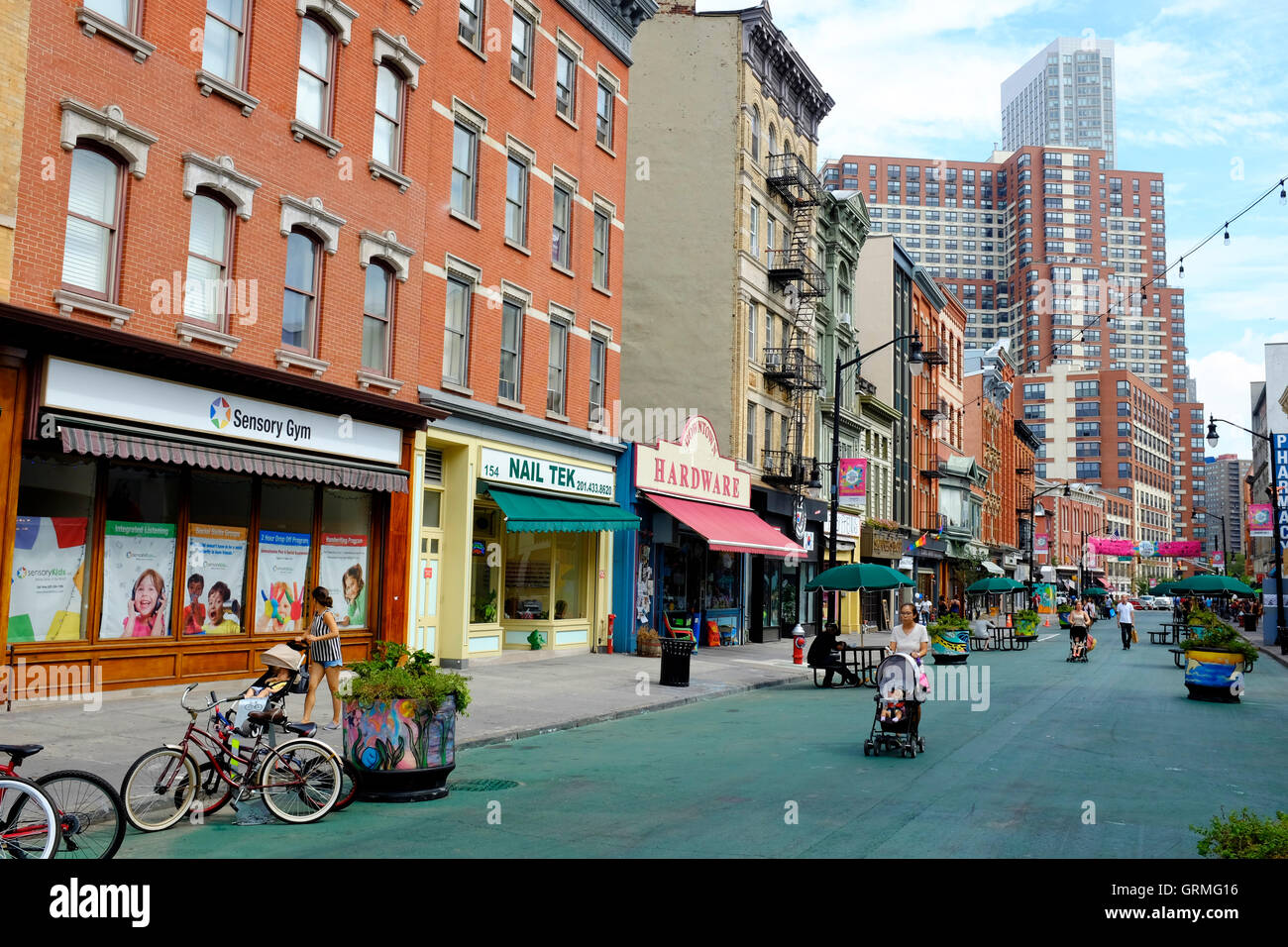 Historic architectures at Newark Avenue with high-rise apartment in the ...